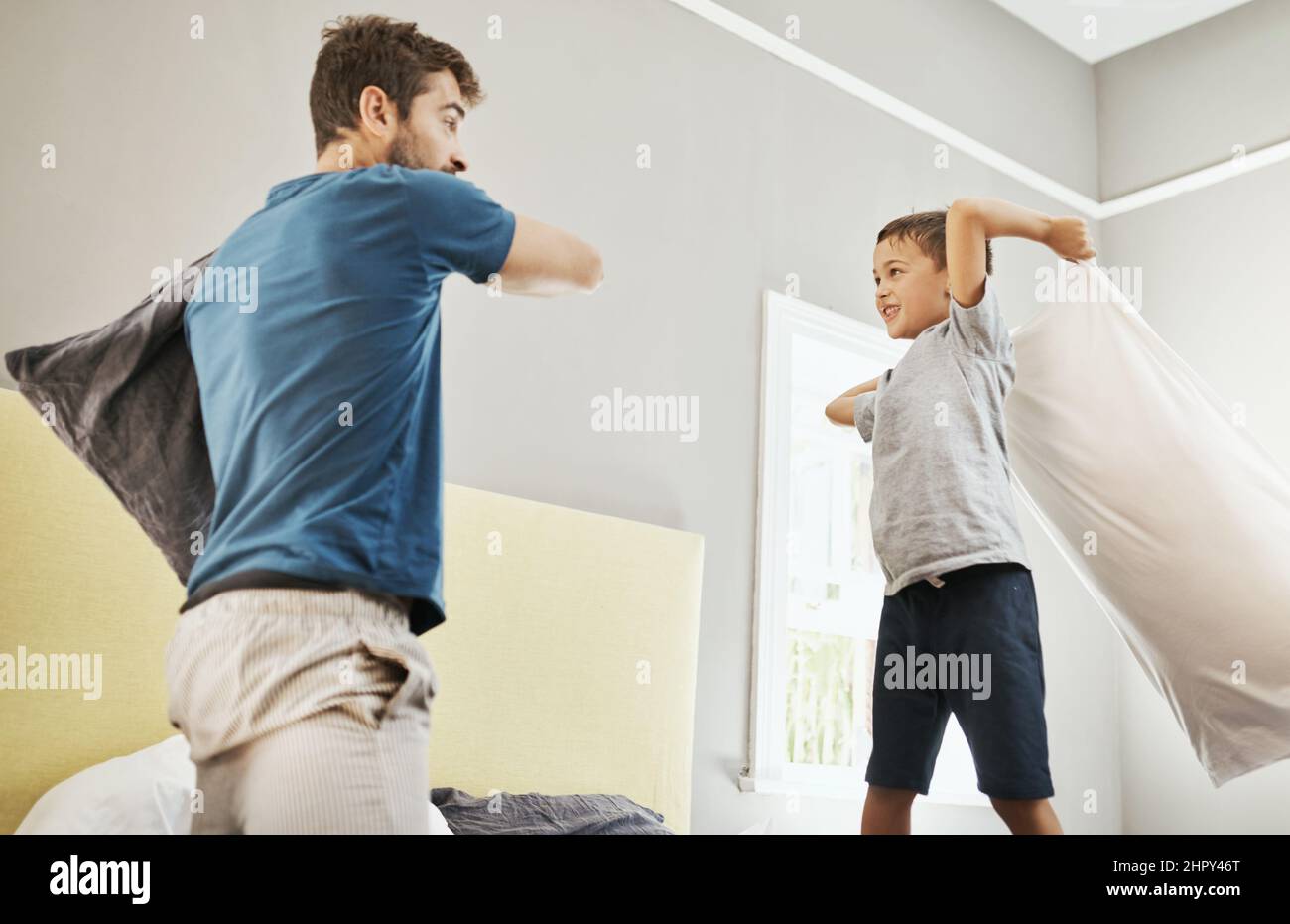 Boy waking up father hi-res stock photography and images - Alamy