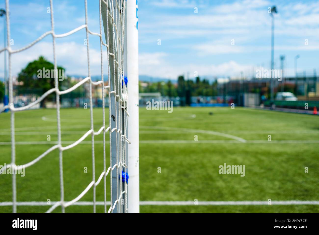 Soccer or football net background, view from beside the goal with ...