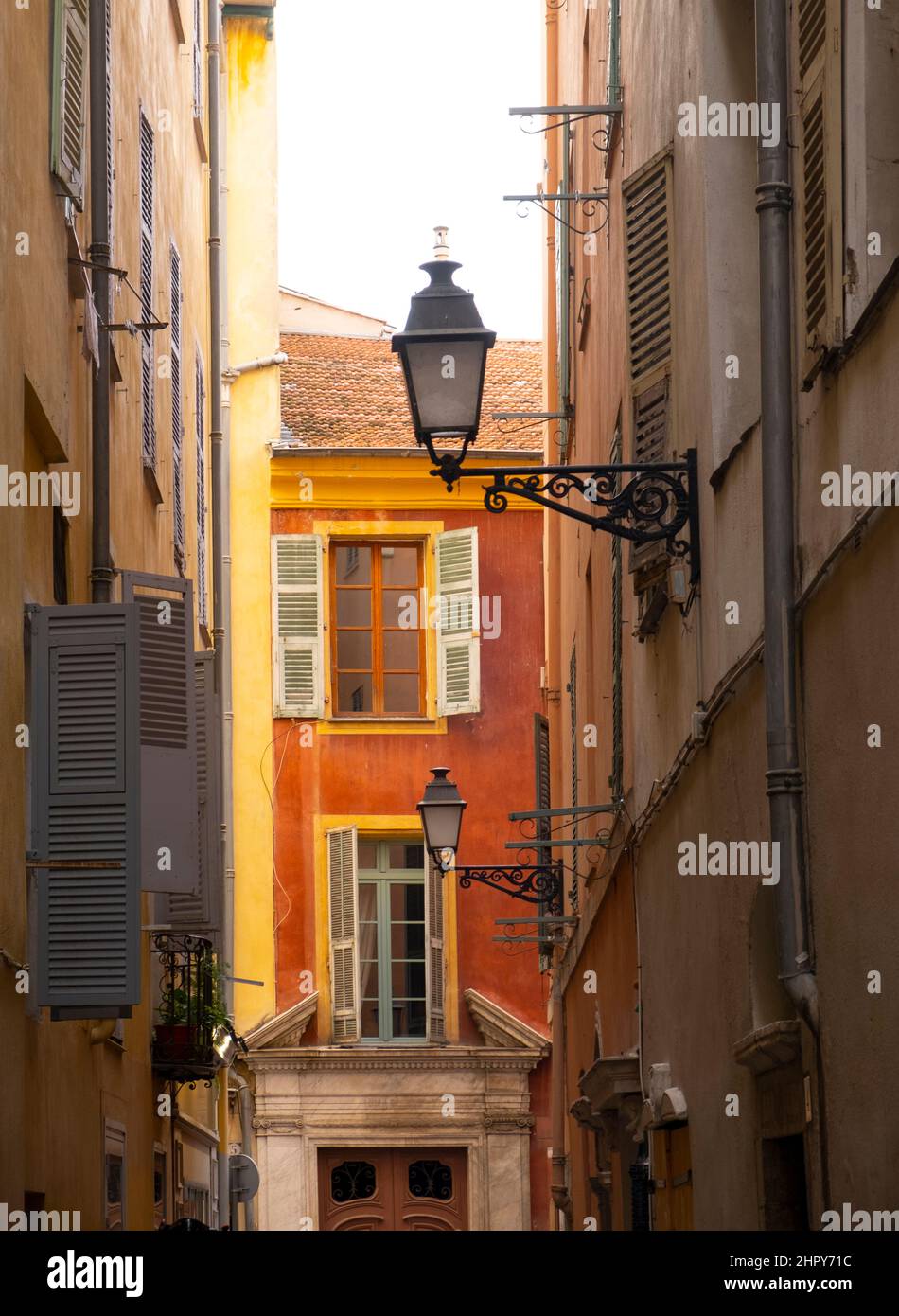 Colourfully painted old buildings in the Old Town section of Nice ...