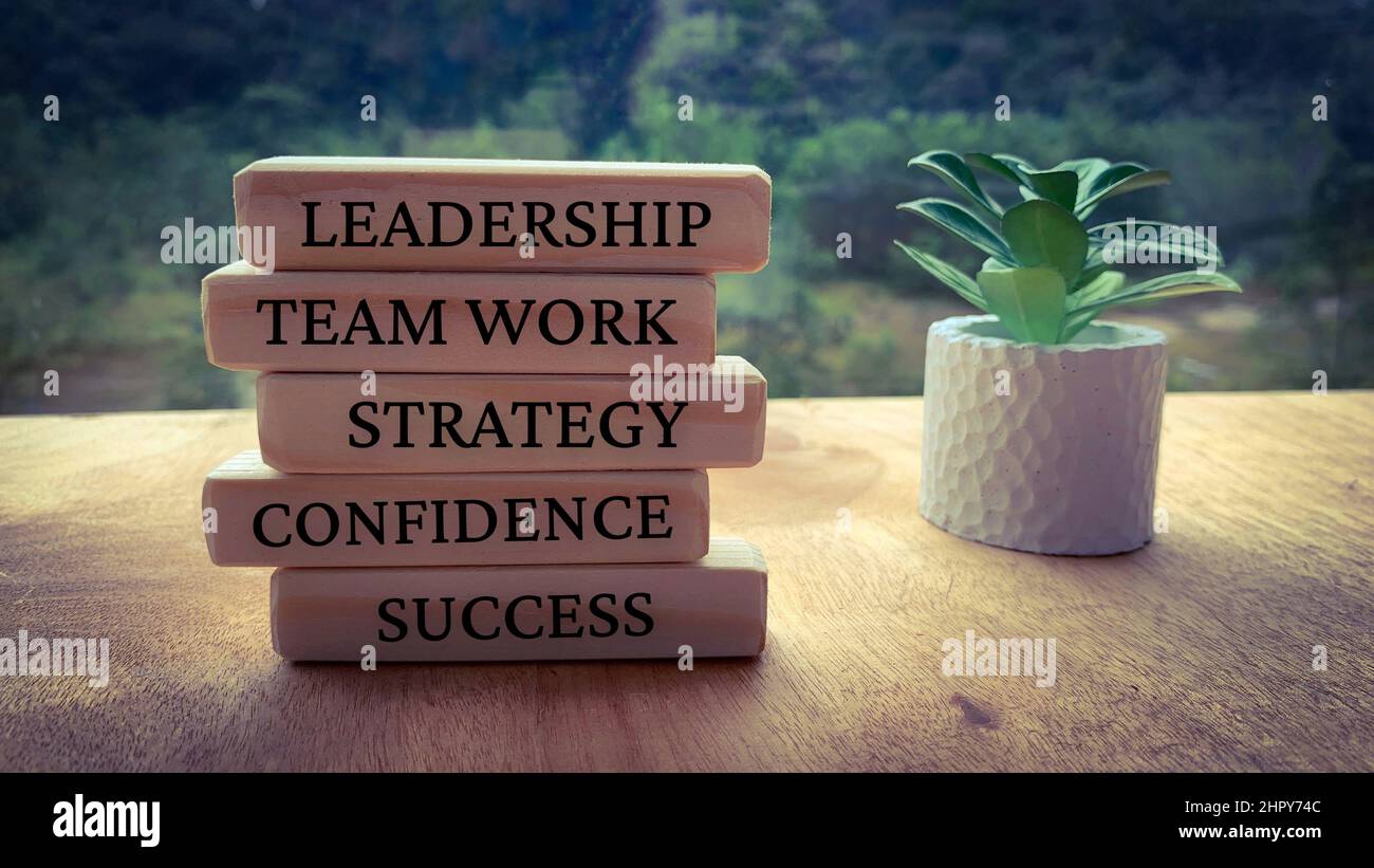 Text on wooden blocks - Leadership, Team work, Strategy, Confidence and ...