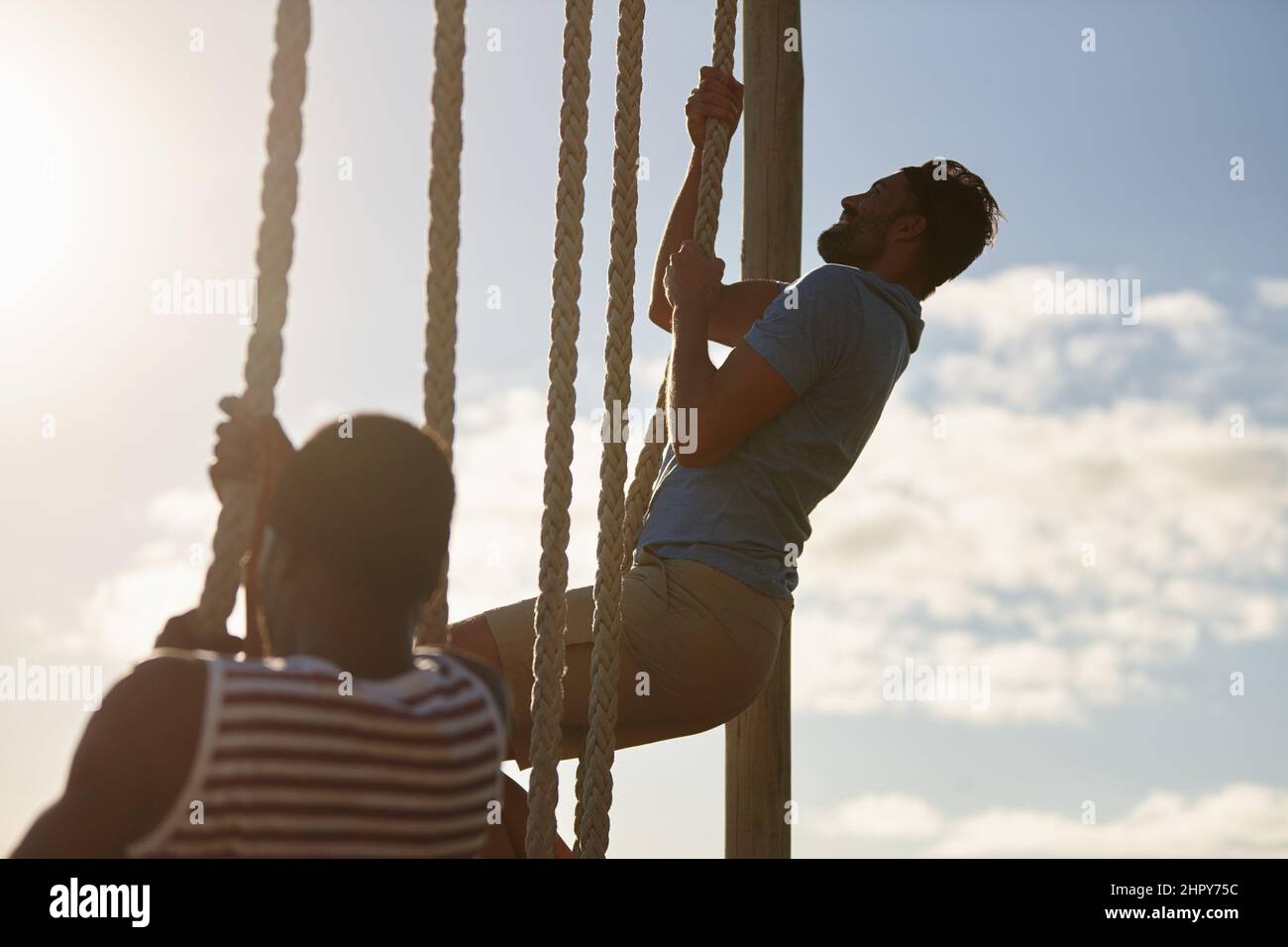 Two men climbing hi-res stock photography and images - Alamy