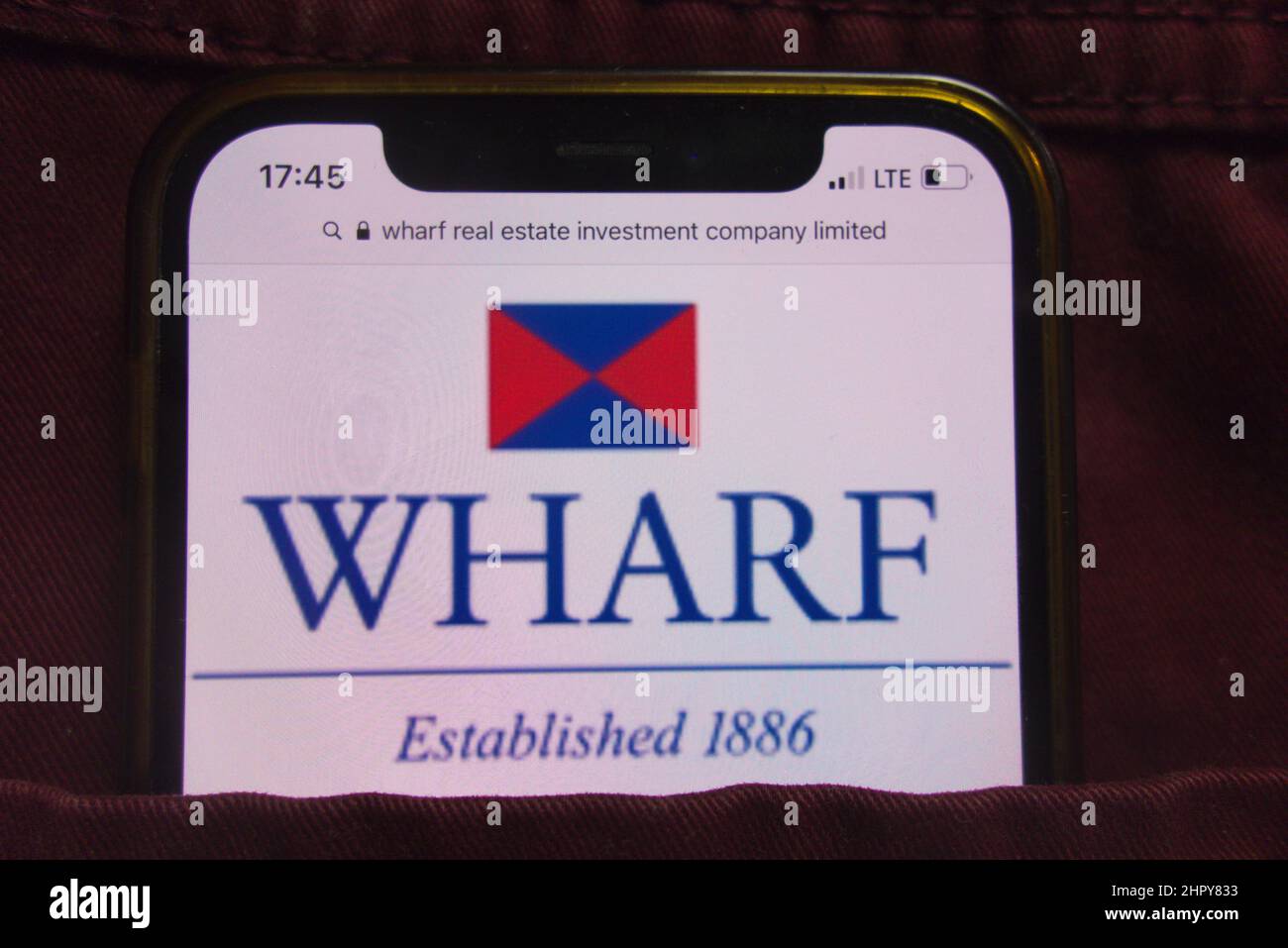 KONSKIE, POLAND - February 22, 2022: Wharf REIC company logo displayed ...