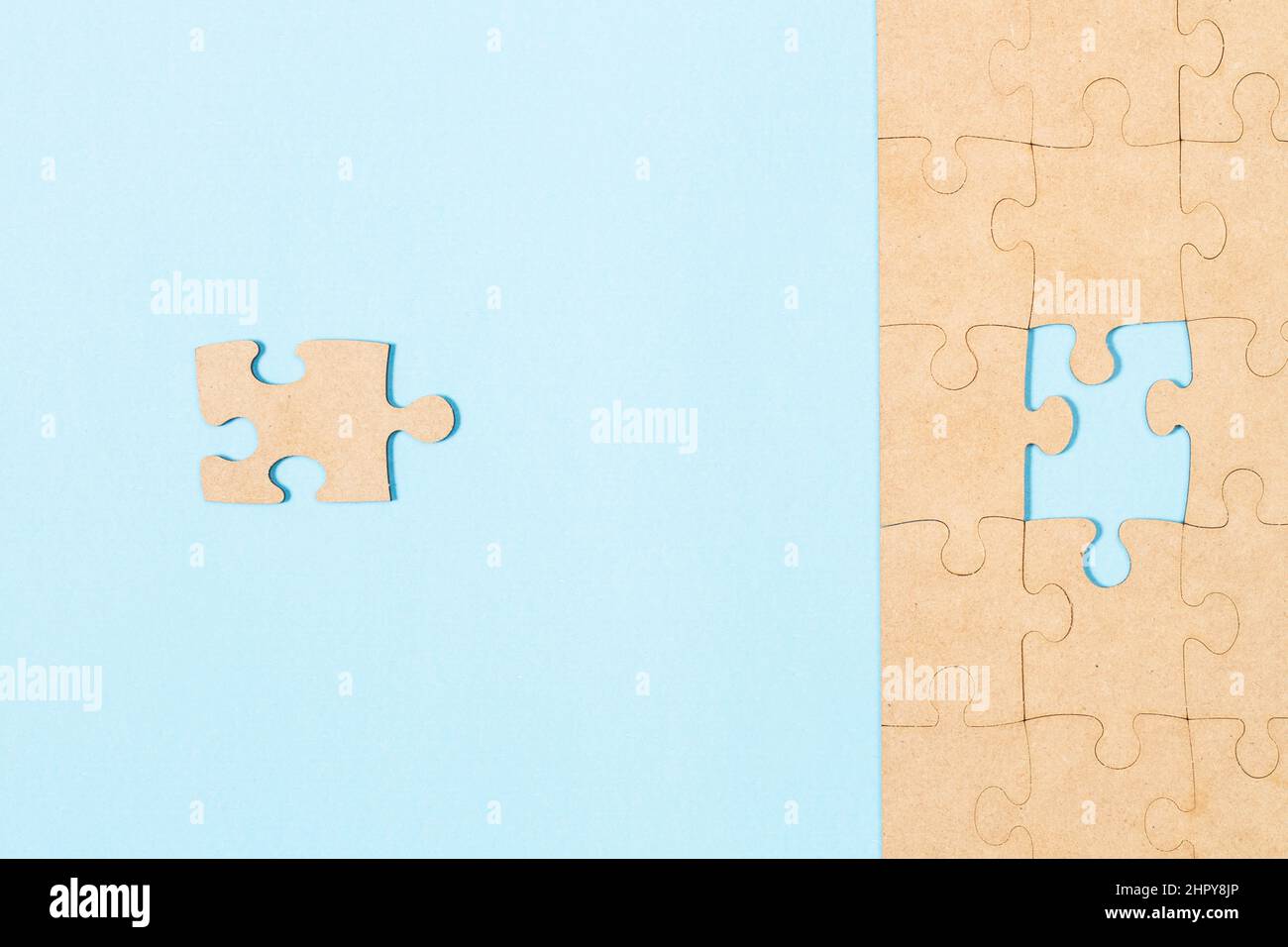 The correct missing puzzle piece on a light blue background in a top ...