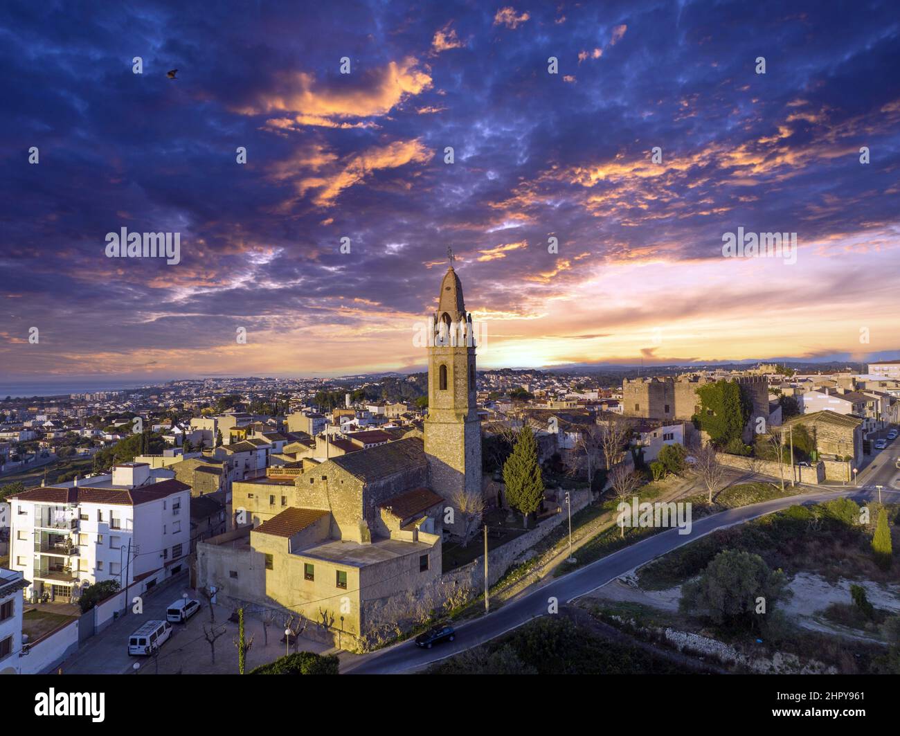 Cityscape of old town in Spain under sunset sky Stock Photo - Alamy