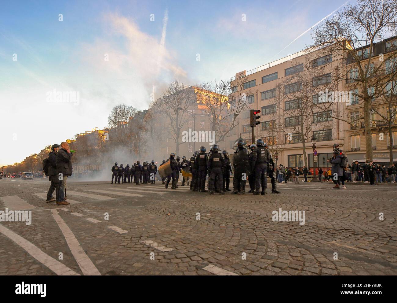 Police deployed on Champs Elysees avenue during freedom convoy. Paris ...