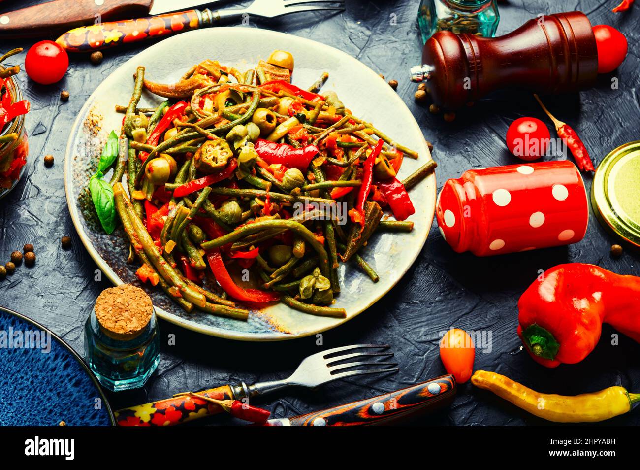 Spicy vegetable appetizer made from pepper, asparagus beans, tomato and ...