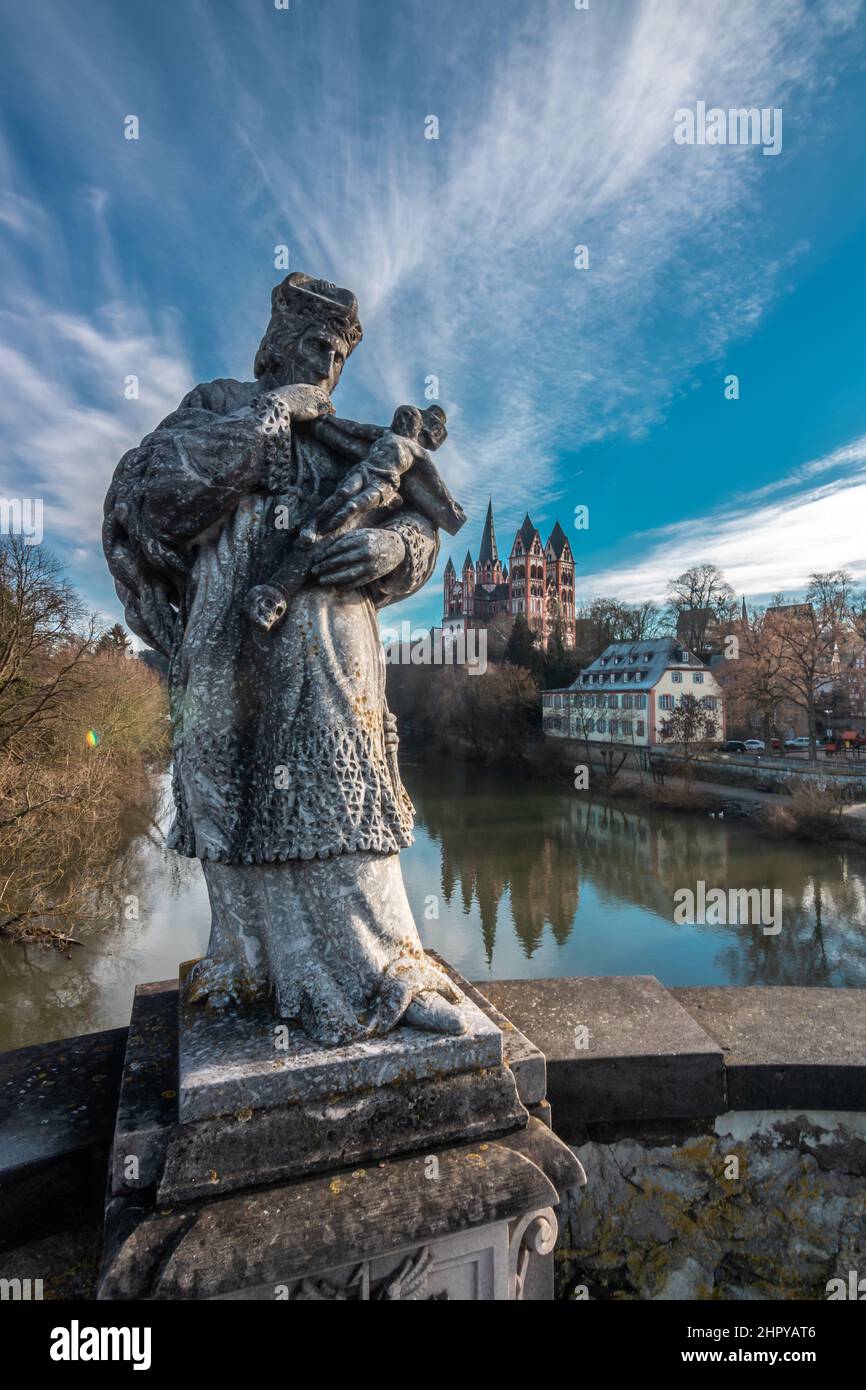 The statue of St. John of Nepomuk on the background of the Limburg ...