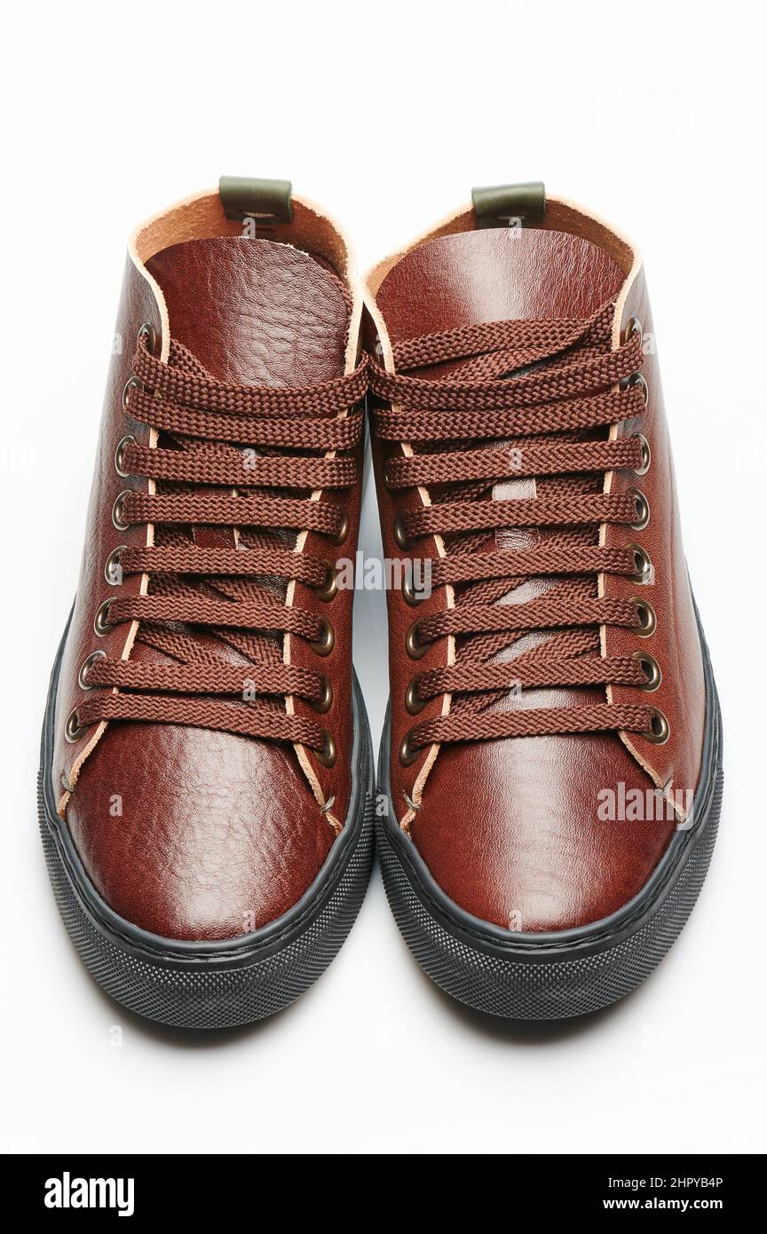 Above top view of brown leather shoes isolated on studio background ...