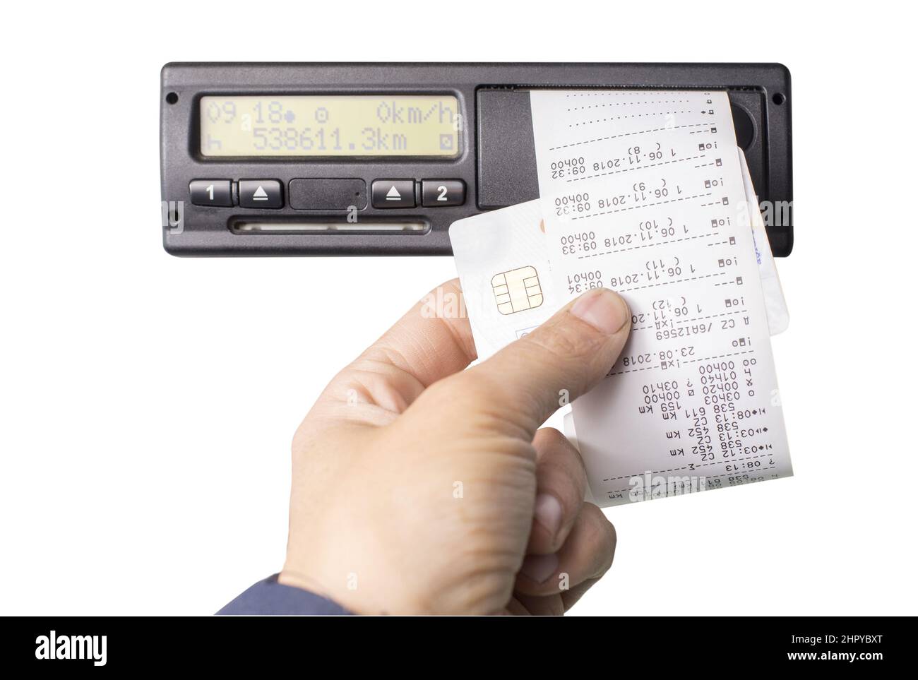 Hand holding a printed time record check coming out of the digital ...
