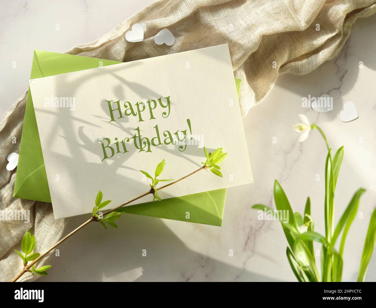 Happy Birthday card Spring background. Paper card and green envelope ...