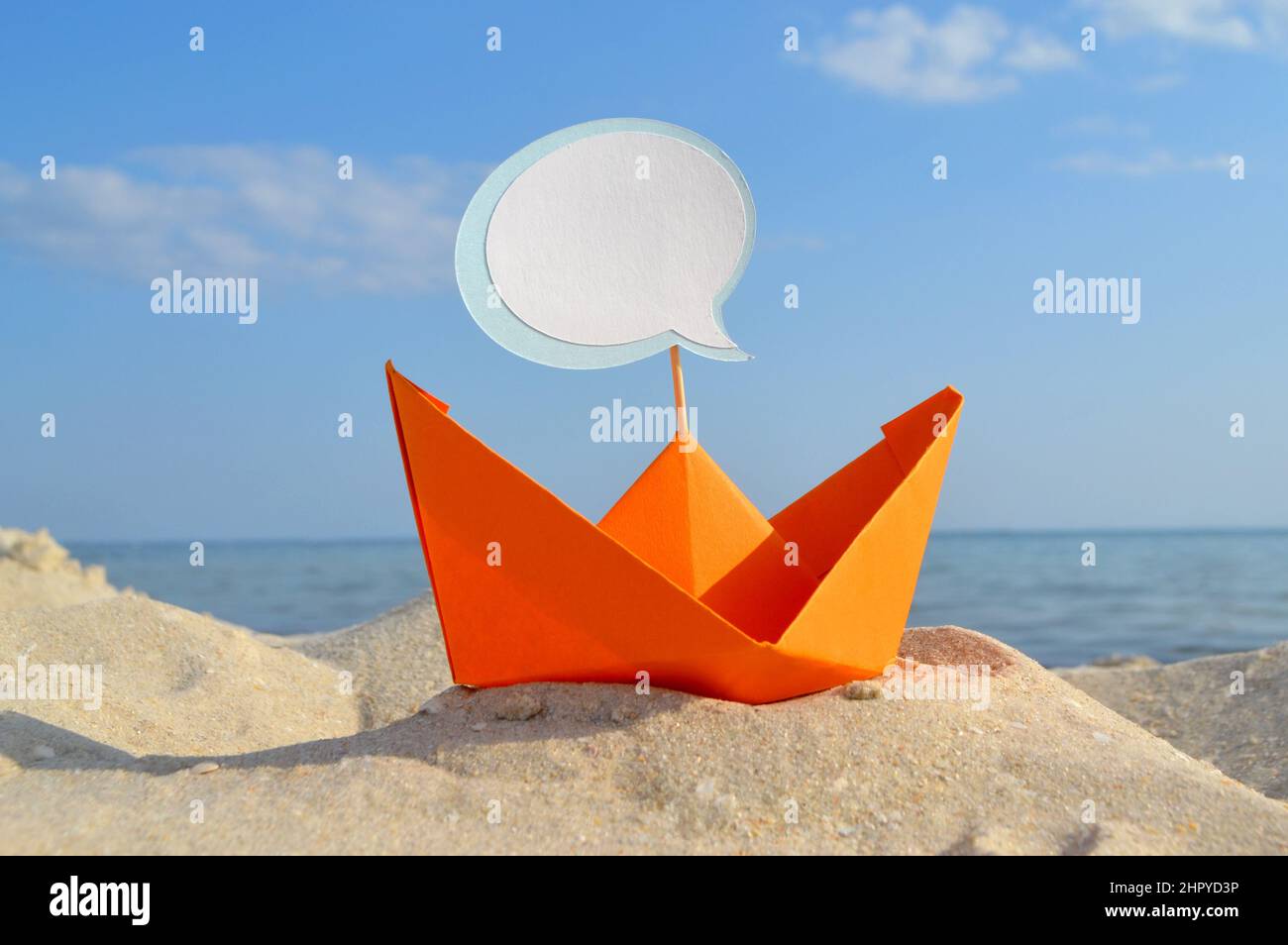 Orange Paper Boat on Sandy Seashore Close-up. Small Paper Boat on ...