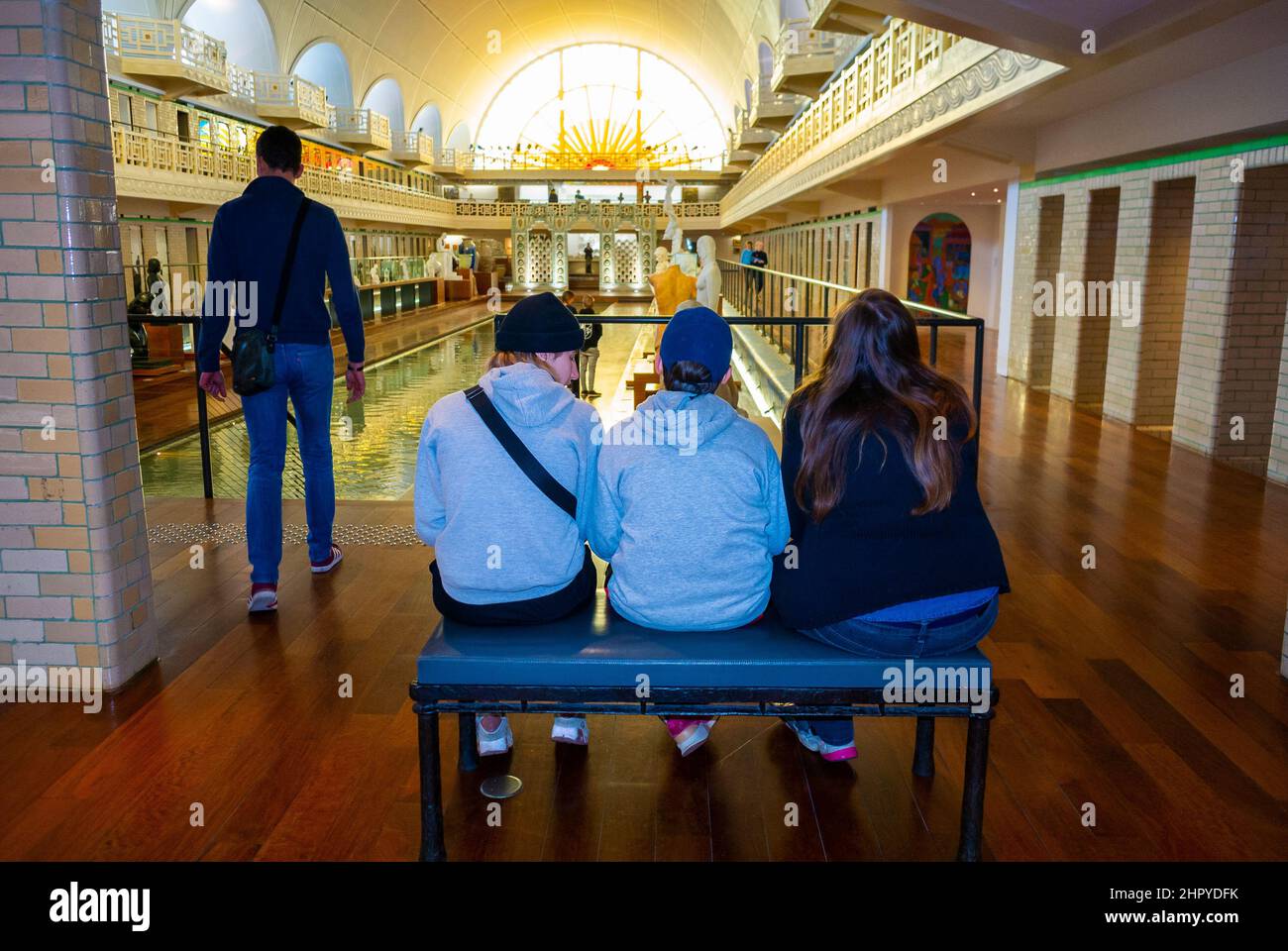 Roubaix, France, Group Young People, Sitting on Bench from behind in ...