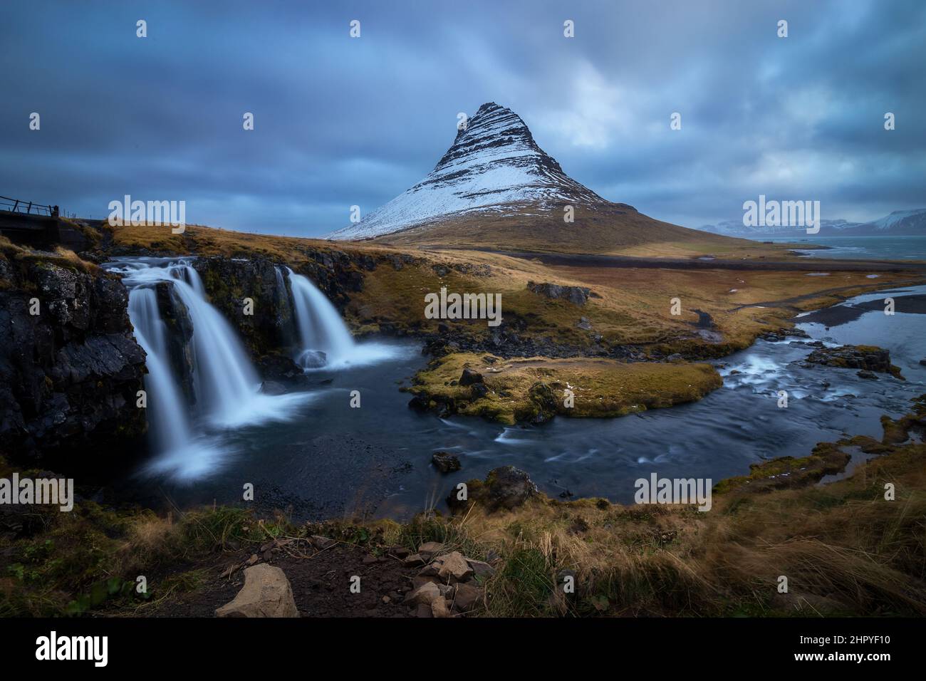 Scenic view of the Kirkjufell mountain and the Kirjufellsfoss ...