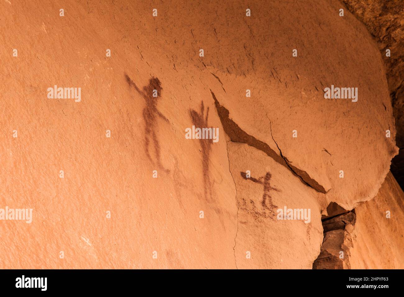An ancient painted Native American rock art or pictograph panel with ...