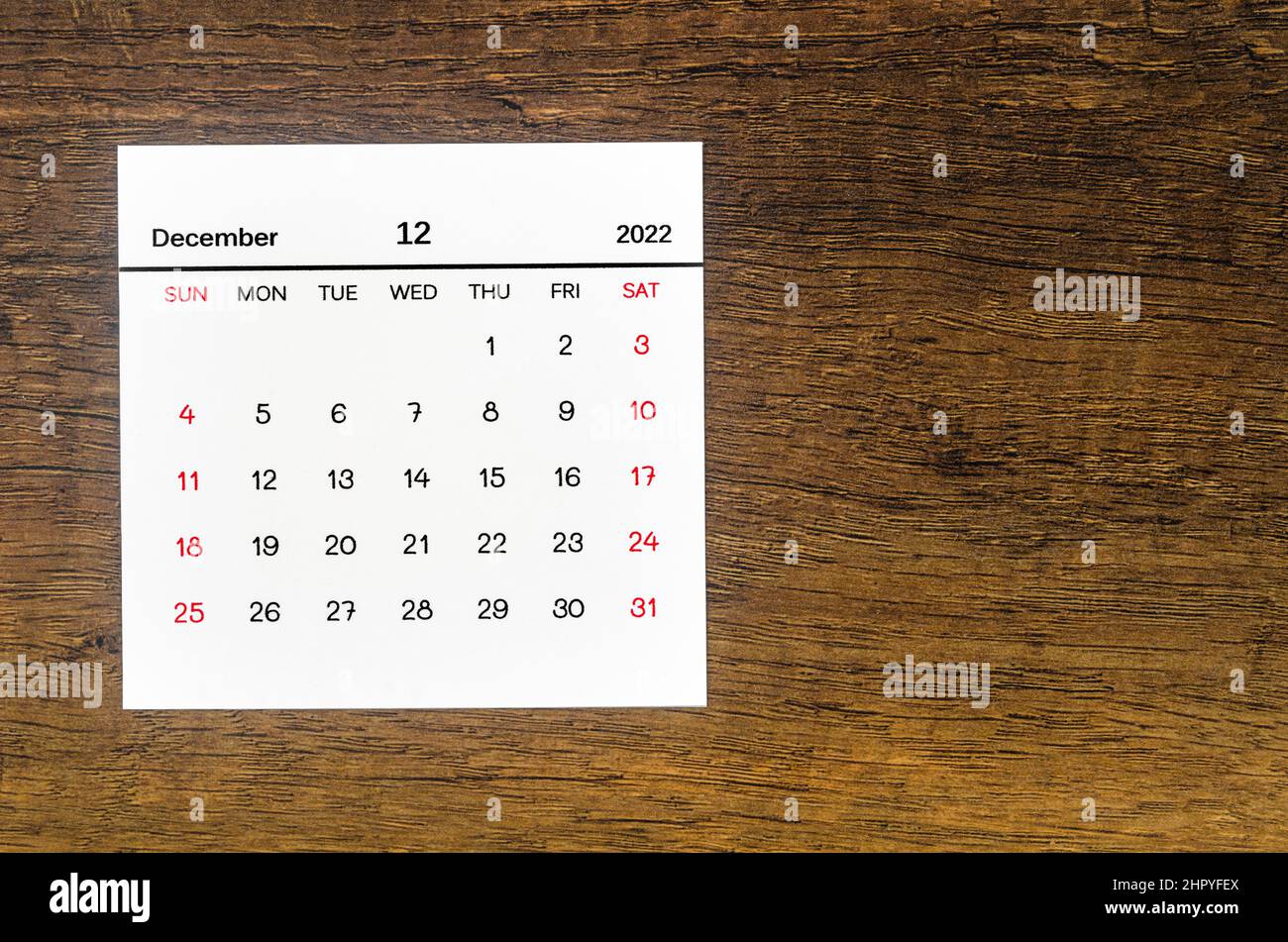 The December 2022 calendar on vintage wooden background Stock Photo - Alamy