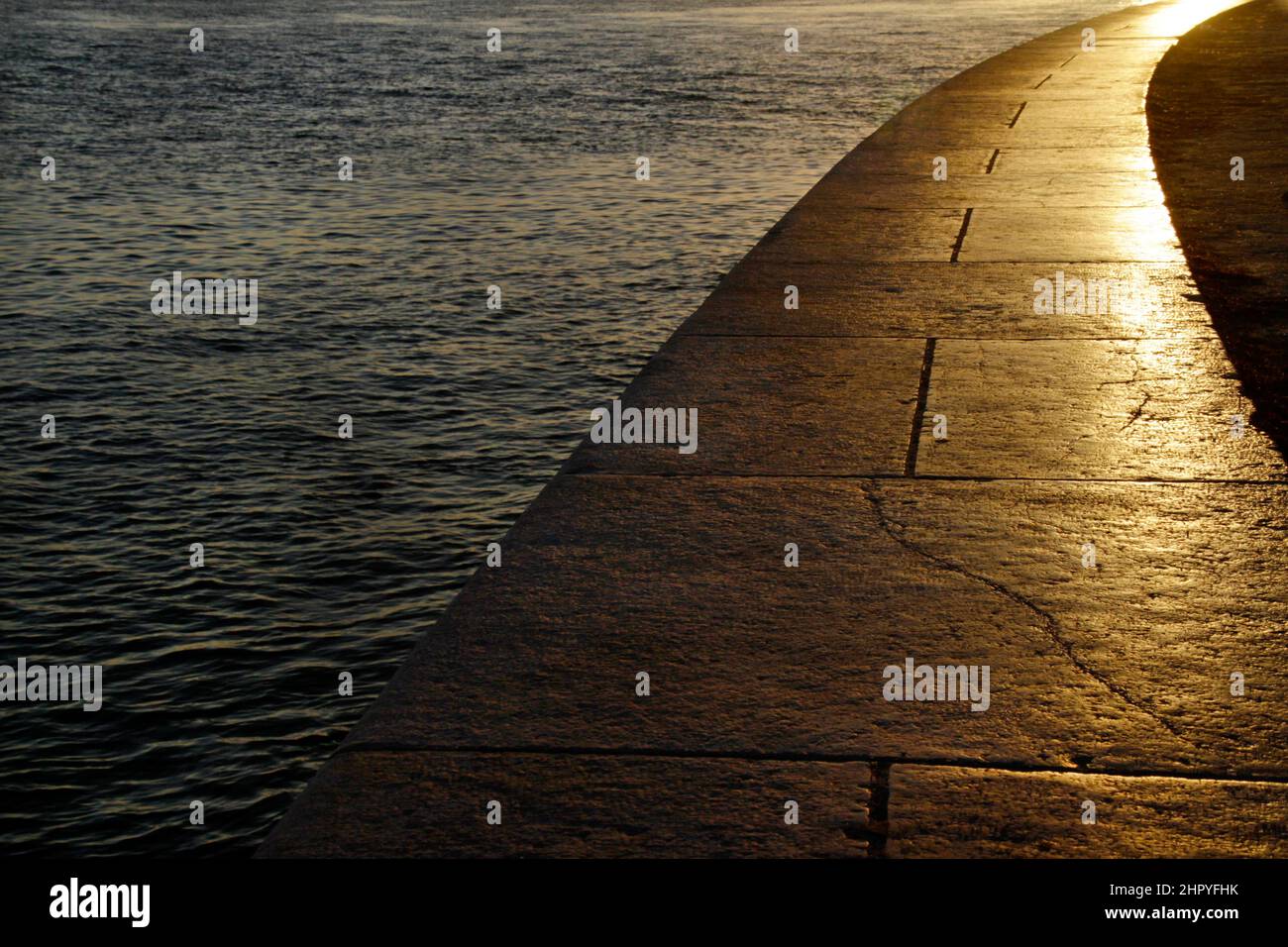 A golden way ahead - sunset at the promenade in Lisbon, Portugal Stock ...