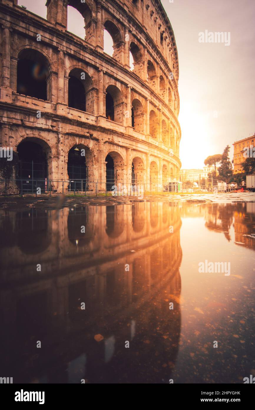 Vertical shot of the historic Colosseum at sunset in Rome, Italy Stock ...