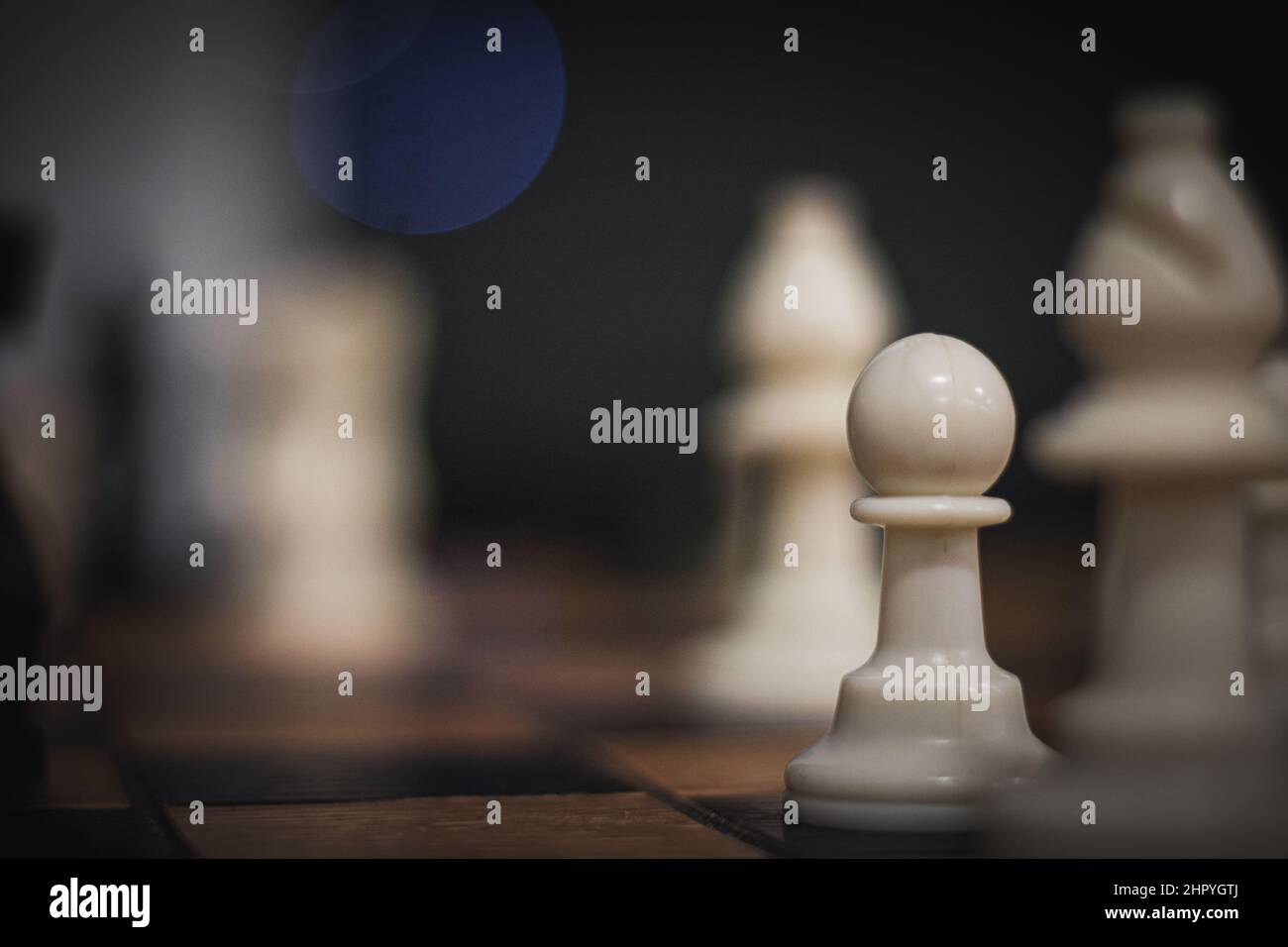 Closeup shot of white pawn chess figure Stock Photo - Alamy