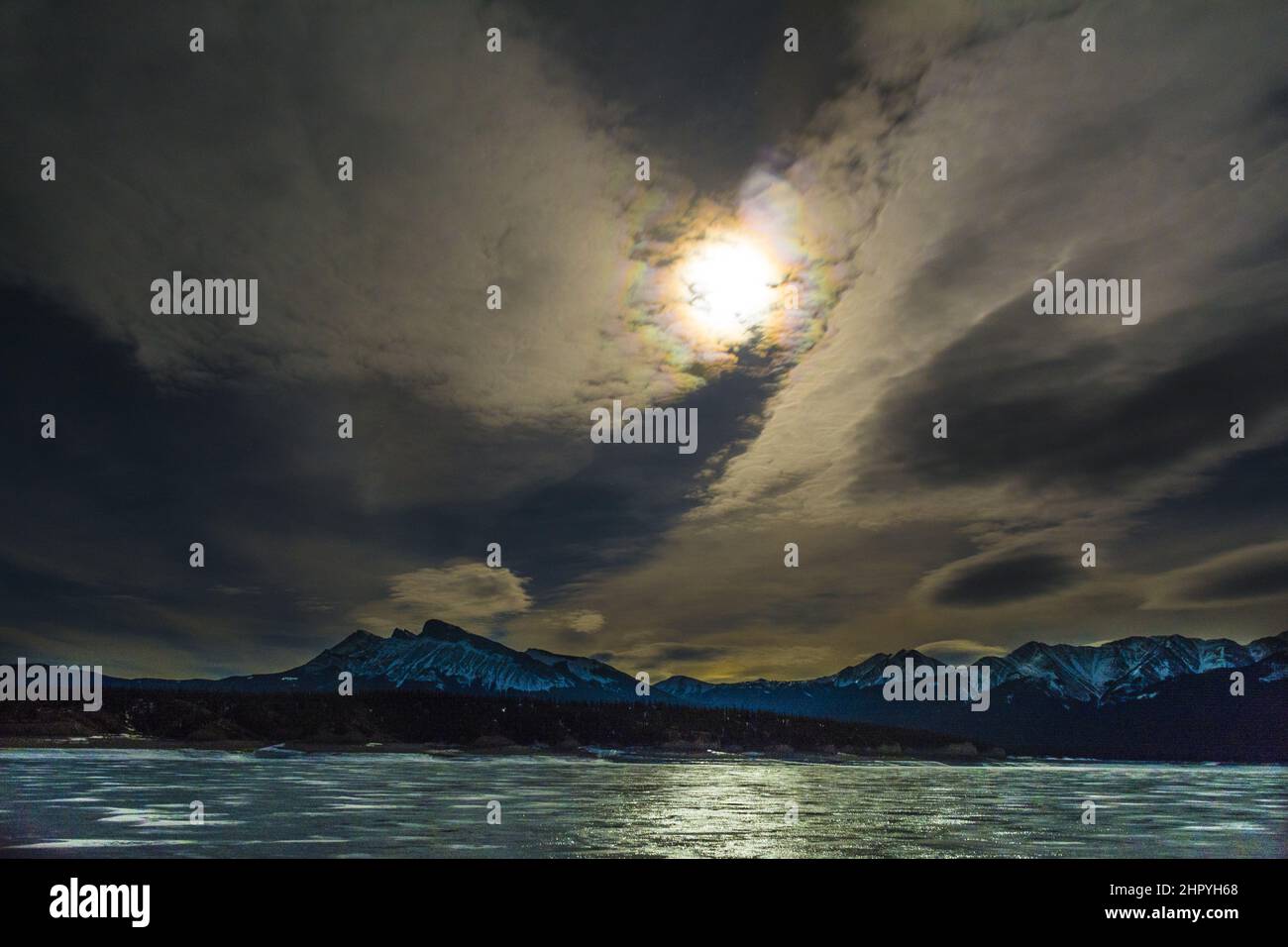 Mesmerizing scene of large shiny gray water and a gray cloudy sky on ...