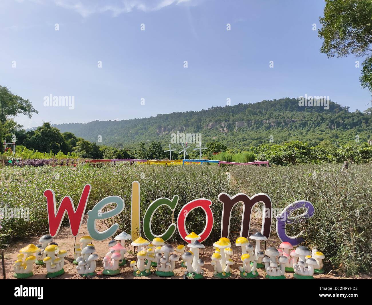 Welcome sign in the farm under a clear sky Stock Photo - Alamy