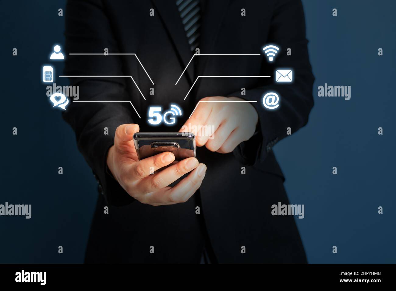 Closeup of a businessman using his phone with 5G internet icons around ...