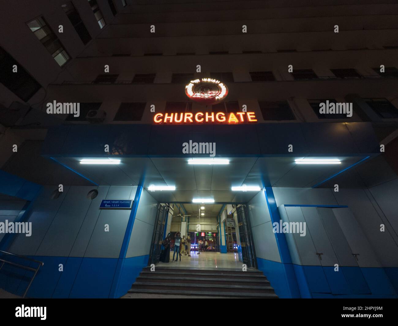 Low angle shot of the Churchgate old railways station at night. Mumbai ...