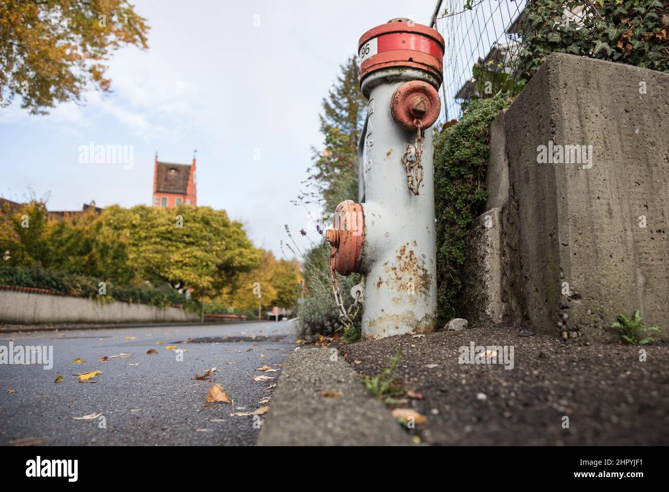 Fire hydrant on a sidewalk Stock Photo - Alamy