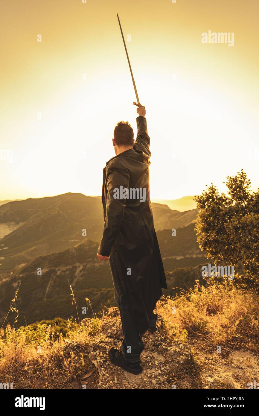 Man holding sword wearing armour hi-res stock photography and images ...