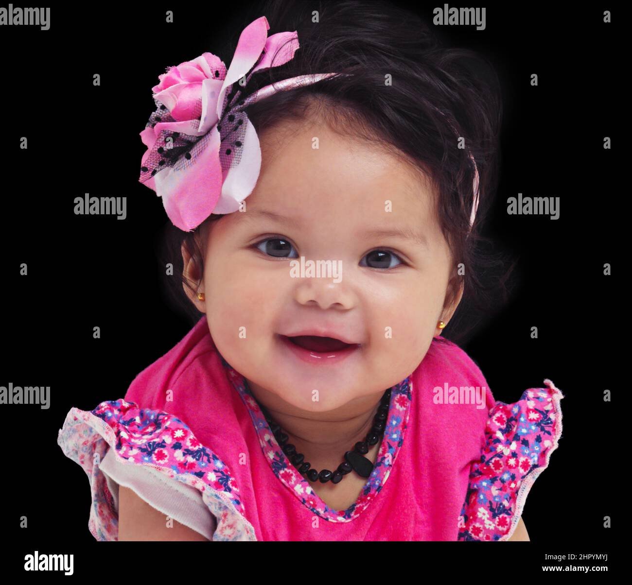 Shes a sweetie. Studio portrait of an adorable baby girl isolated on ...