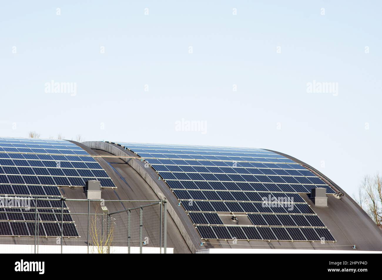 Large curved roof with solar panels for electric power generation in ...