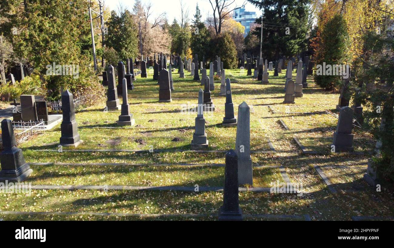 Arial drone view flight over old cemetery with tombstones, gravestones ...