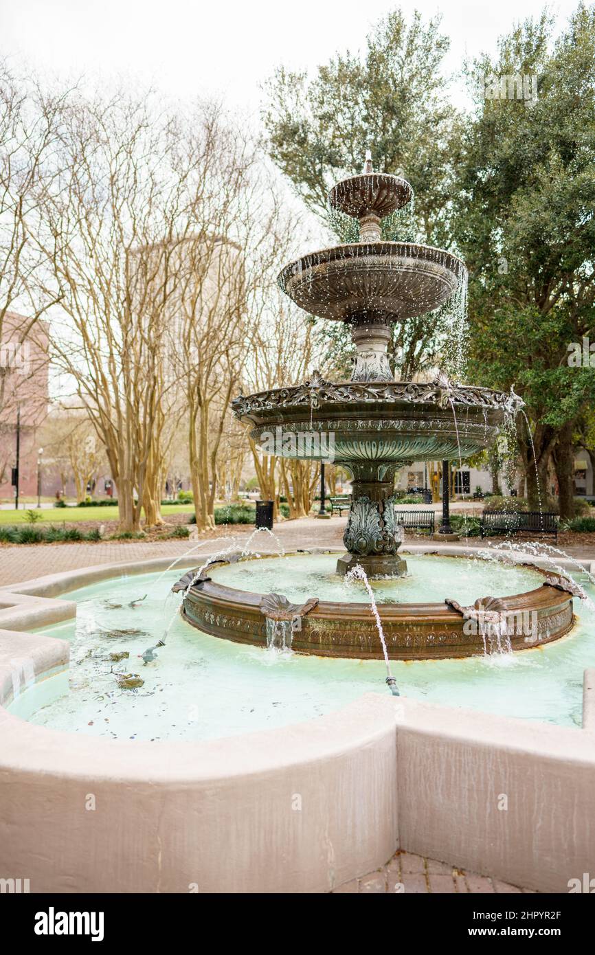 Multi tier water fountain at a park Stock Photo - Alamy
