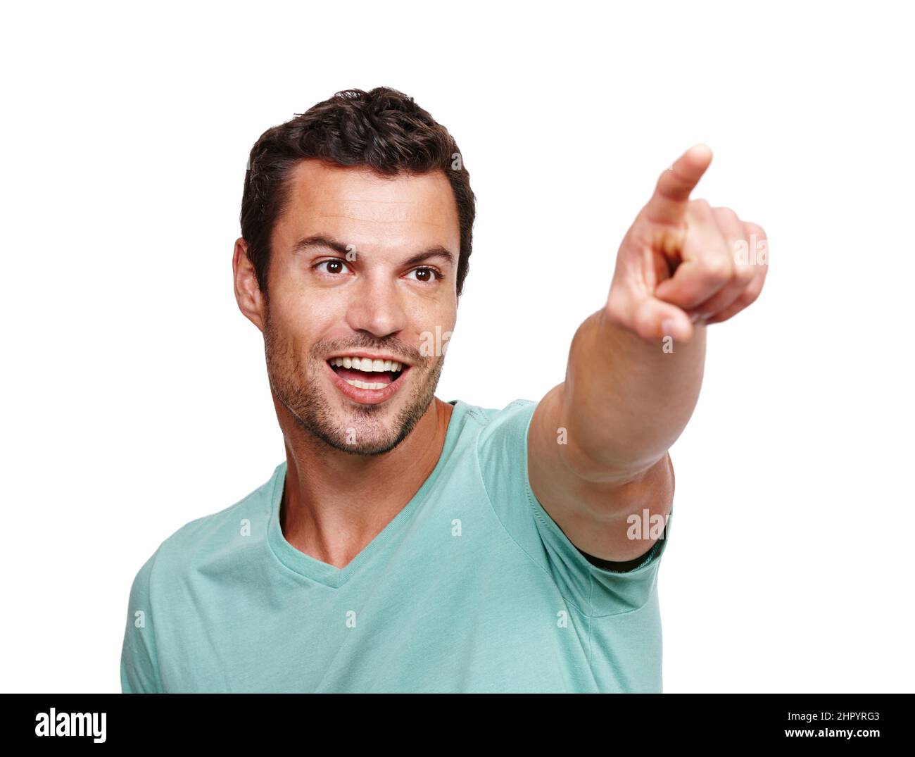 Pointing the way forward. A smiling man pointing into the distance ...