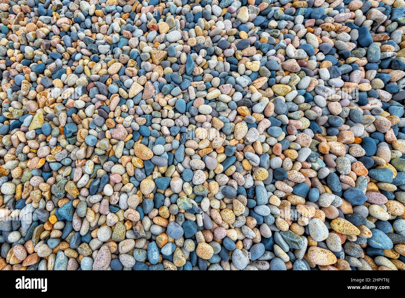 Impressive granite, dolerite and diorite pebbles on the coast ...