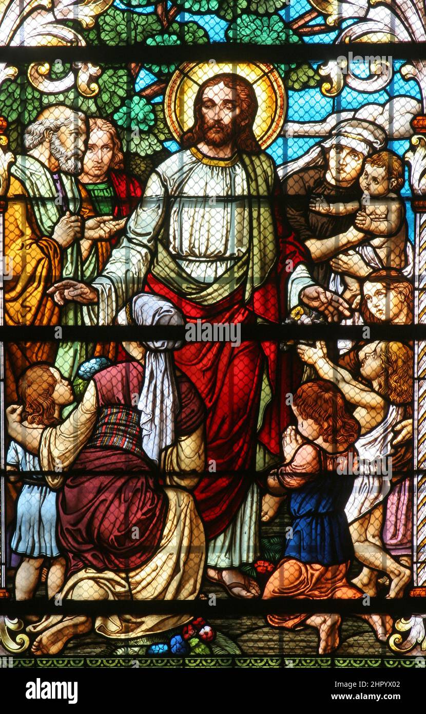 Jesus blesses mothers with children, stained glass window in the Saint ...