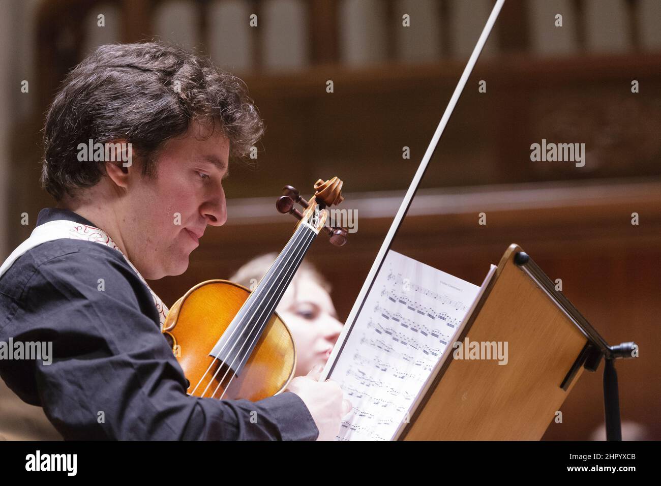 Violinist, Adrian Chandler rehearsing with the ensembles La Serenissima ...