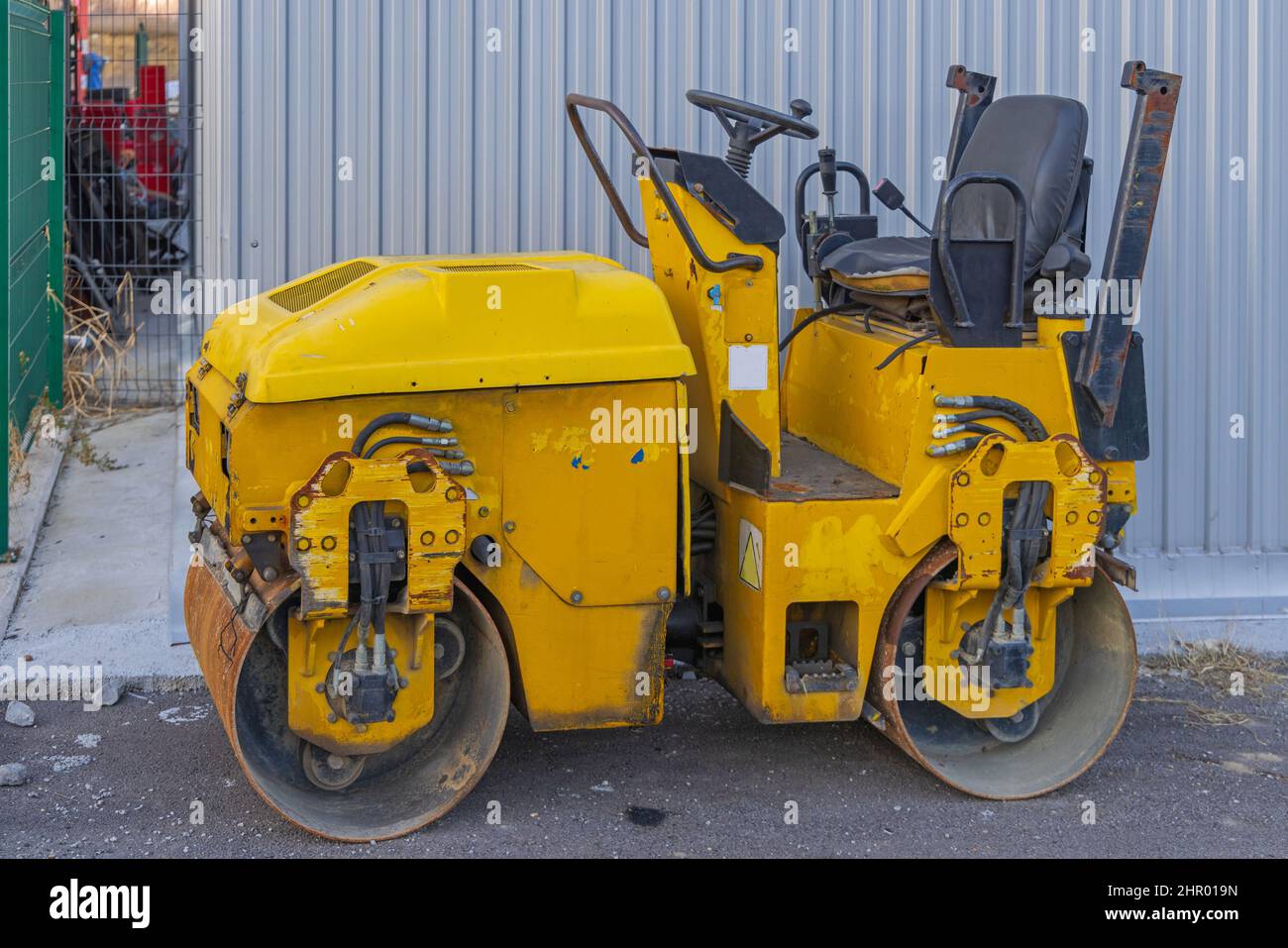 Smooth Wheeled Roller Yellow Vehicle Machine at Construction Site Stock ...