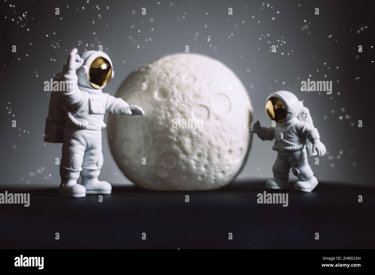 Astronaut and the Moon toys Stock Photo - Alamy