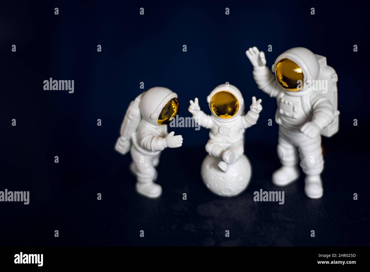 Astronaut and the Moon toys Stock Photo - Alamy