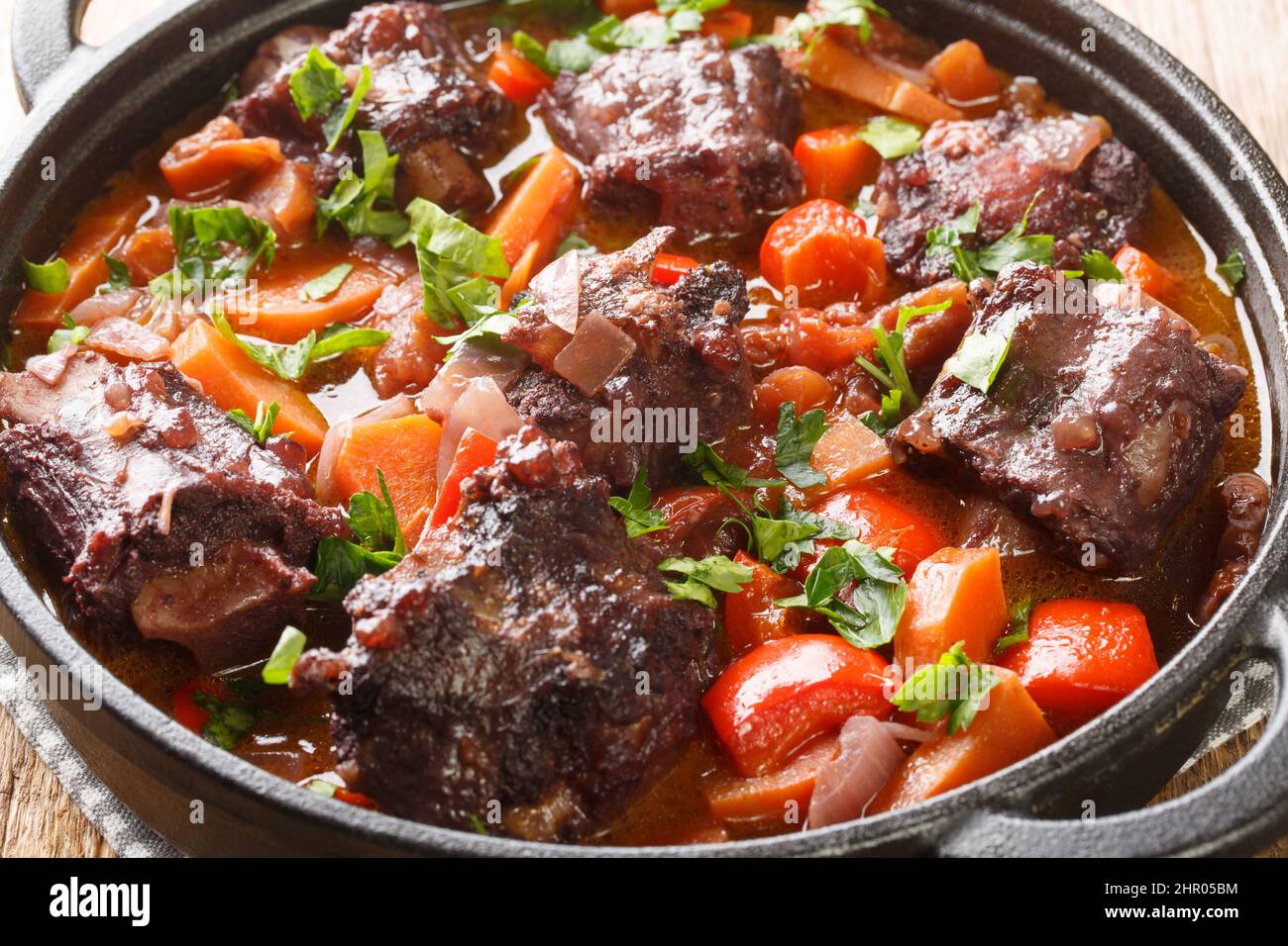 Beef tail oxtail stew cooked in traditional spanish food rabo de toro ...