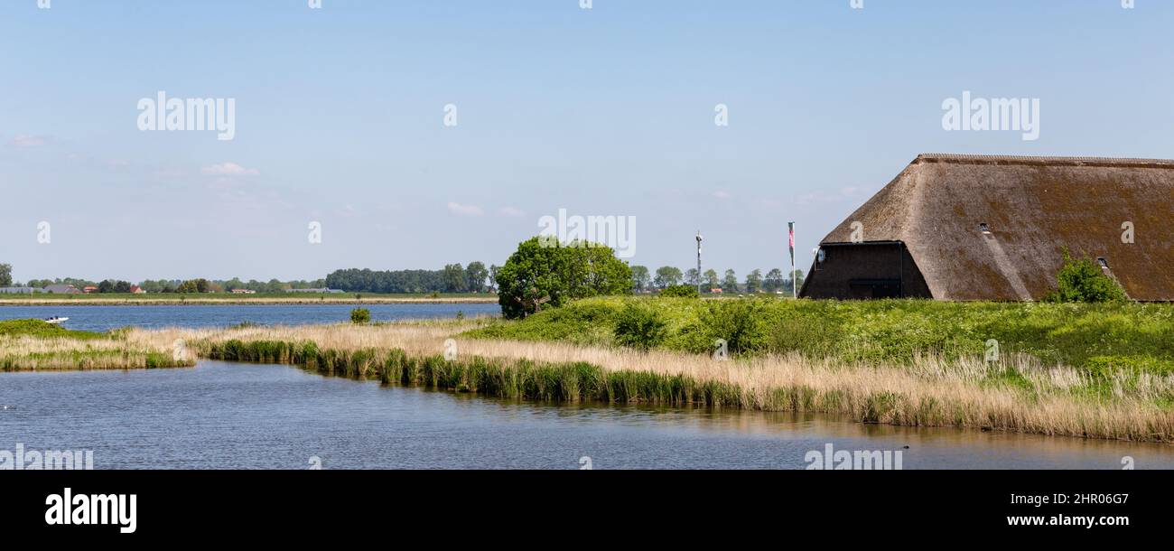 Panorama with main entrance building of island and nature reserve ...