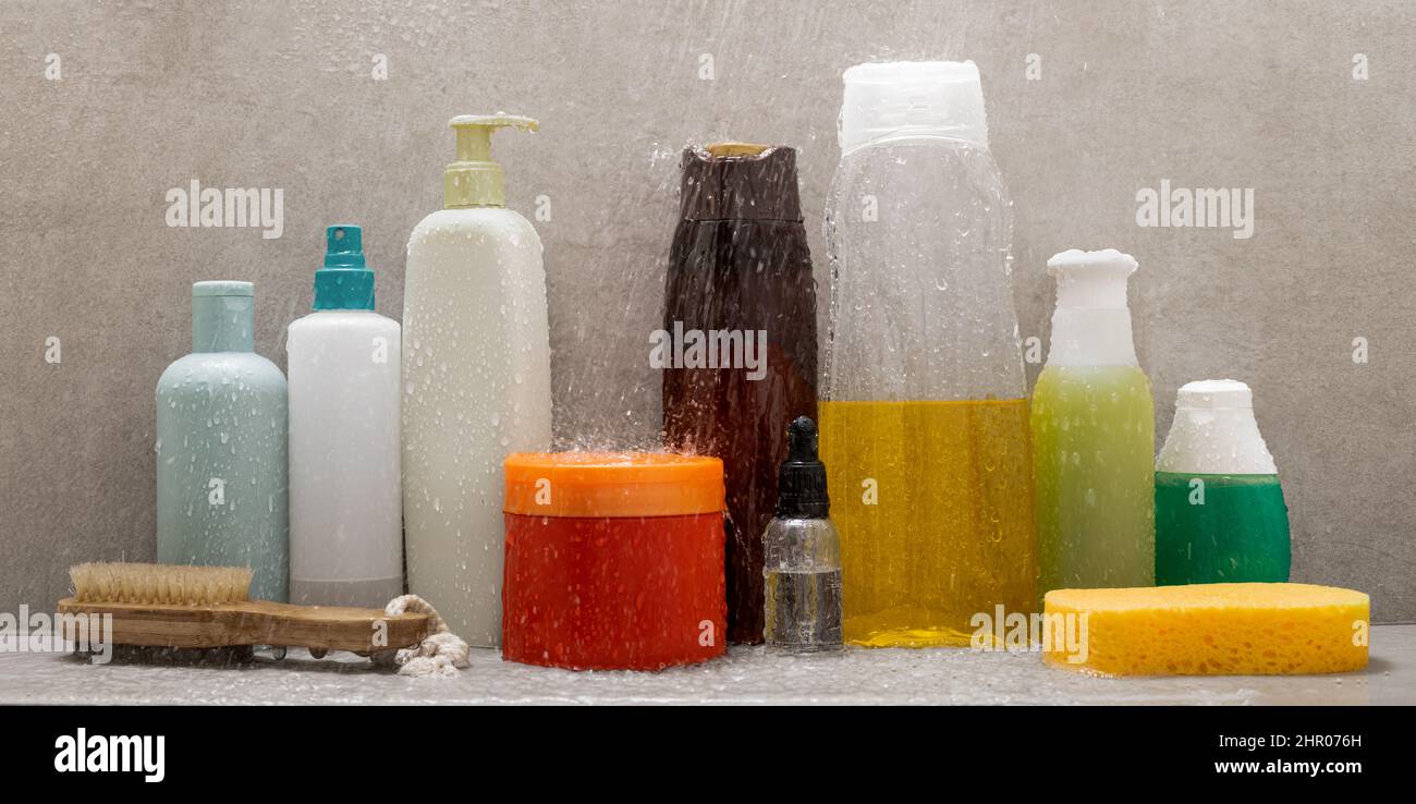 Personal hygiene products in the shower splashed by shower water on ...