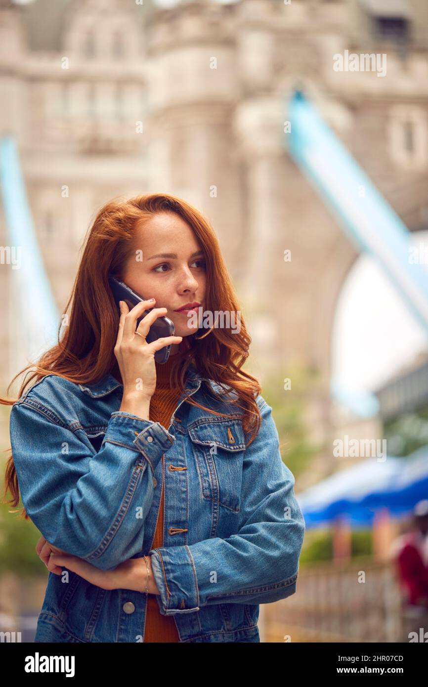 Female Vlogger Travelling Through London Making Phone Call On Mobile ...