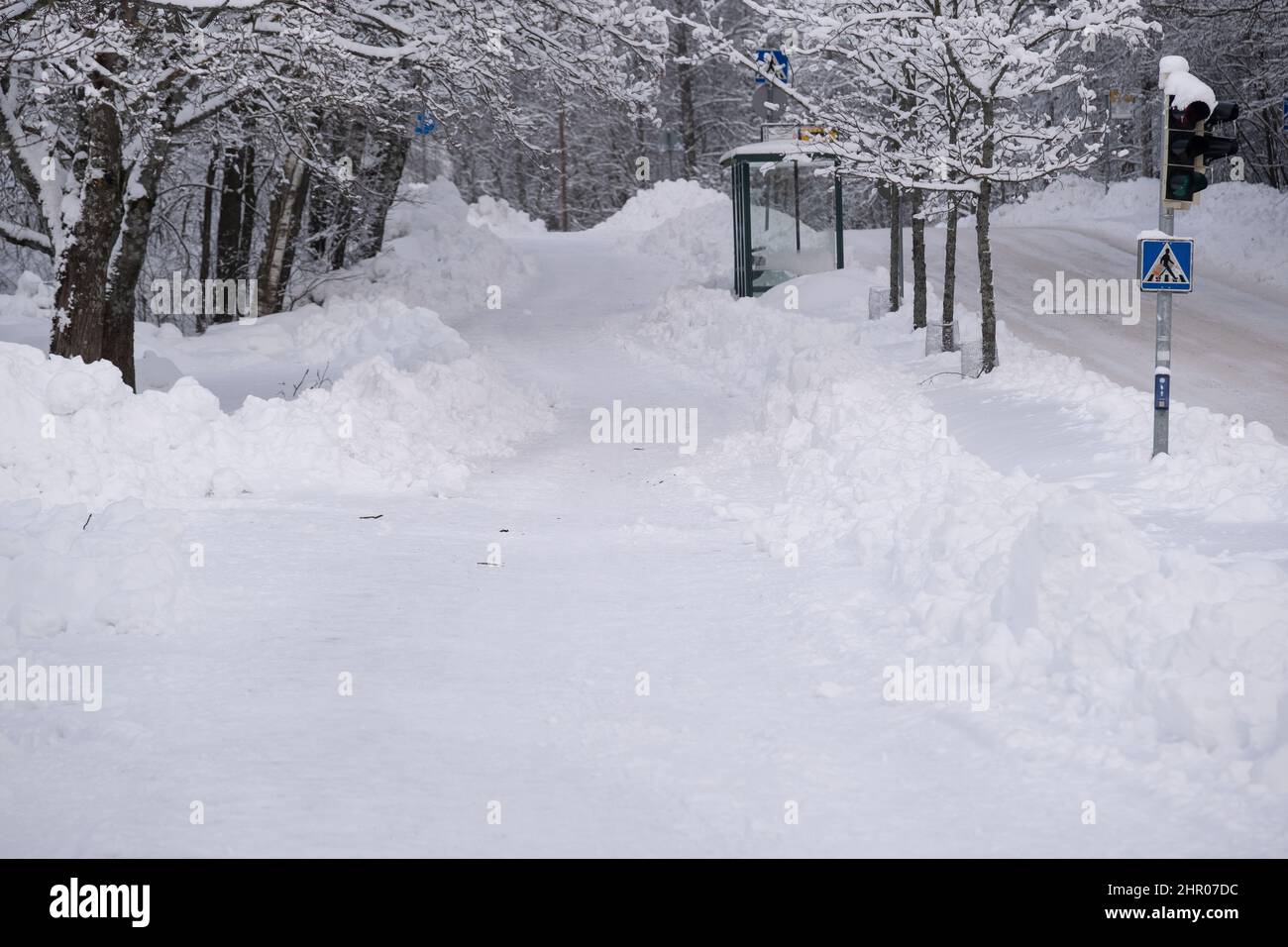 Helsinki / Finland - FEBRUARY 24, 2022: Snow-covered roads and parks in ...