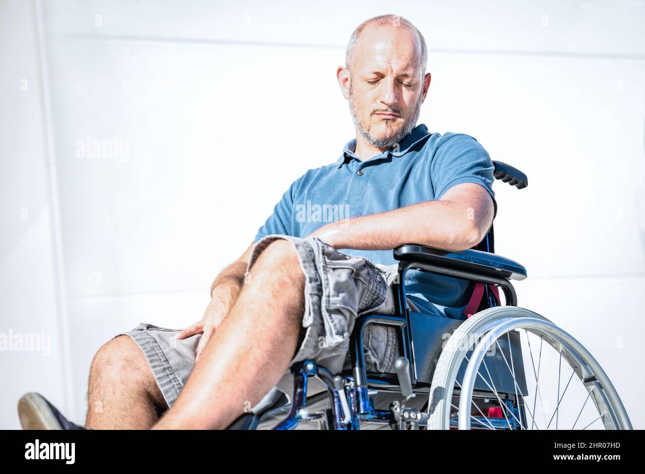 Disabled man with handicap on wheelchair in depression moment ...