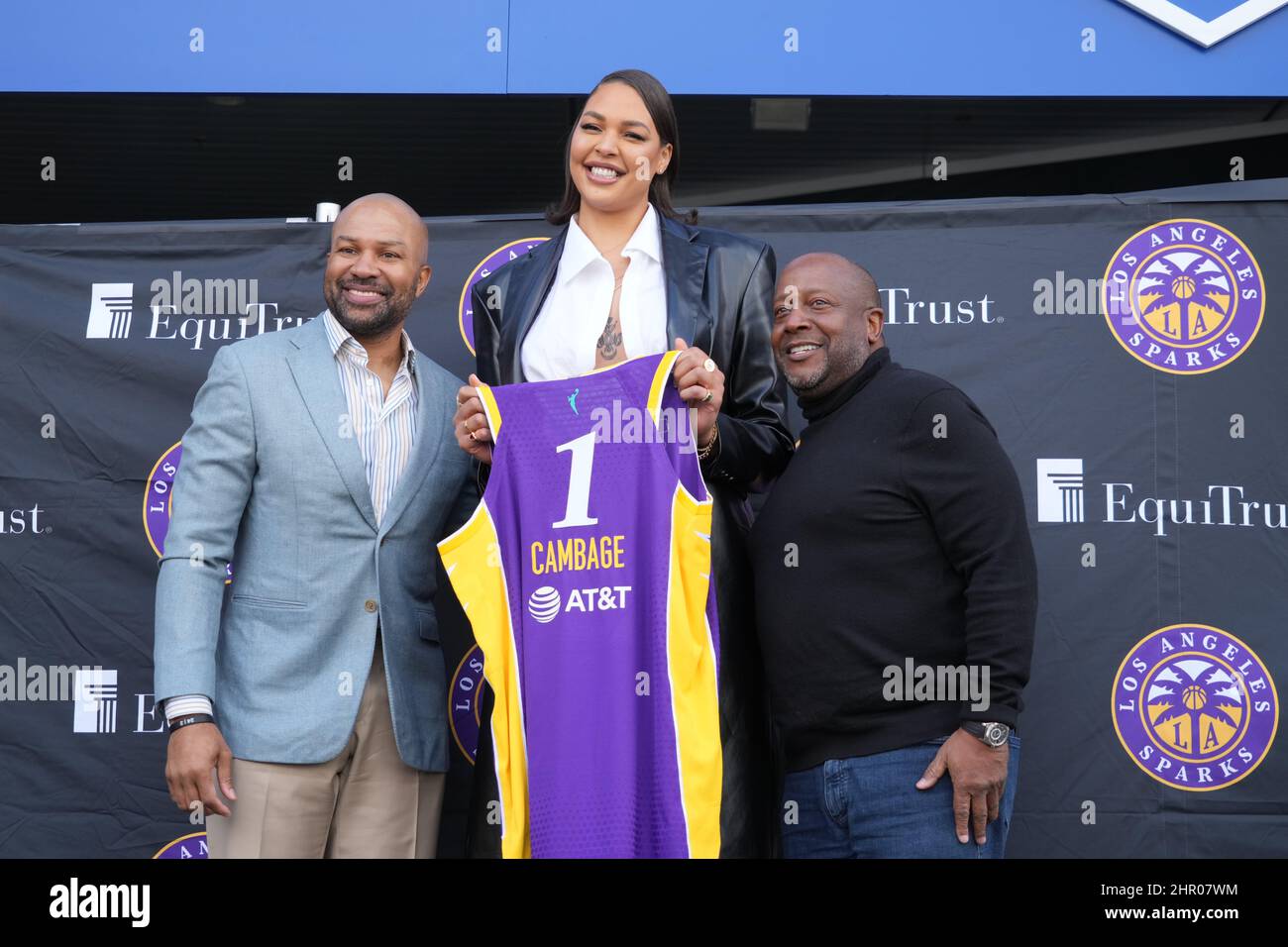 Liz Cambage (center) poses with Los Angeles Sparks general manager and ...