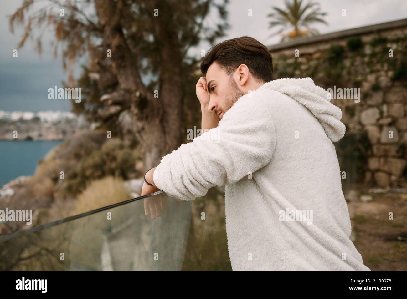 Sad young man in depression, disorder and pessimism after sad and ...