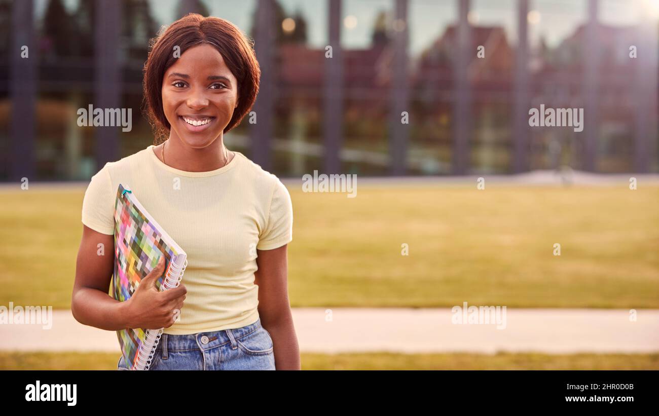 Portrait Of Female University Or College Student Standing By Modern ...
