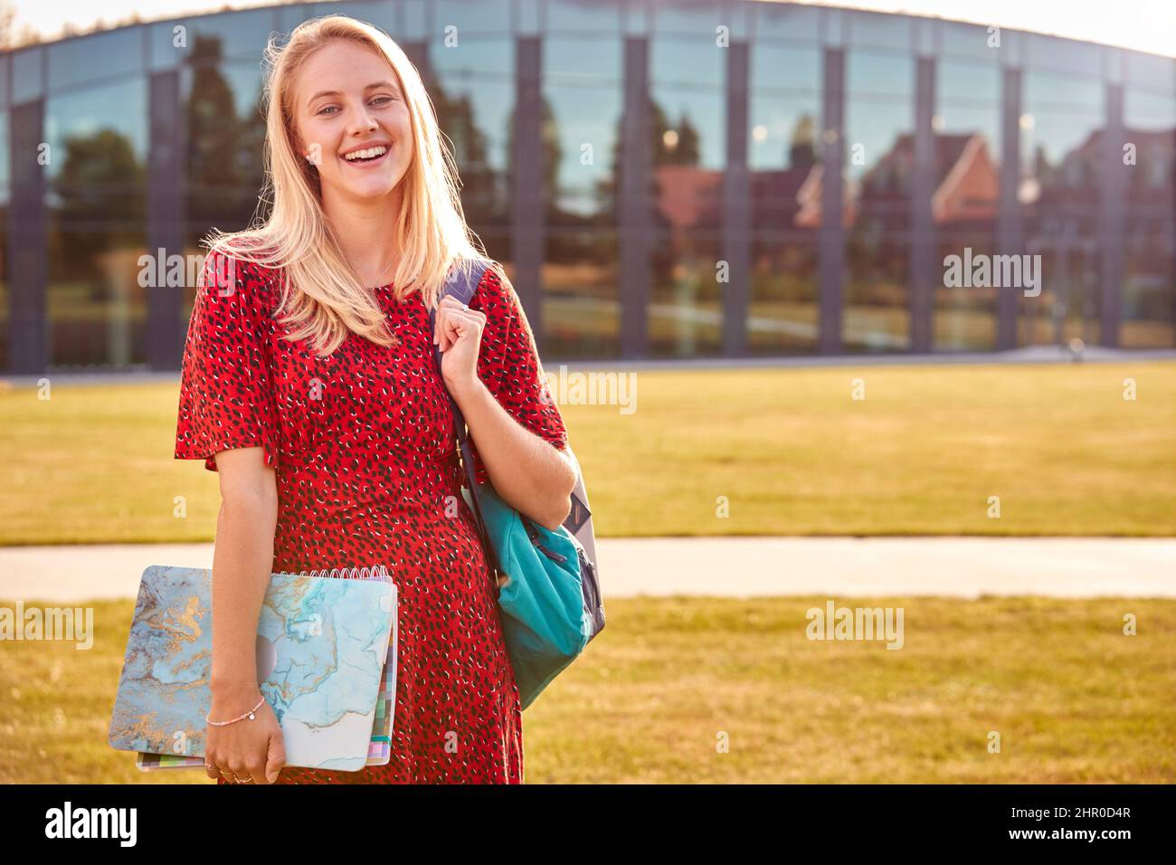 Portrait Of Female University Or College Student Standing Outdoors By ...
