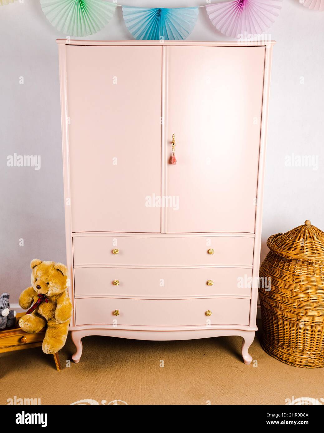 Pink old wardrobe after renovation painted in pink color Stock Photo ...